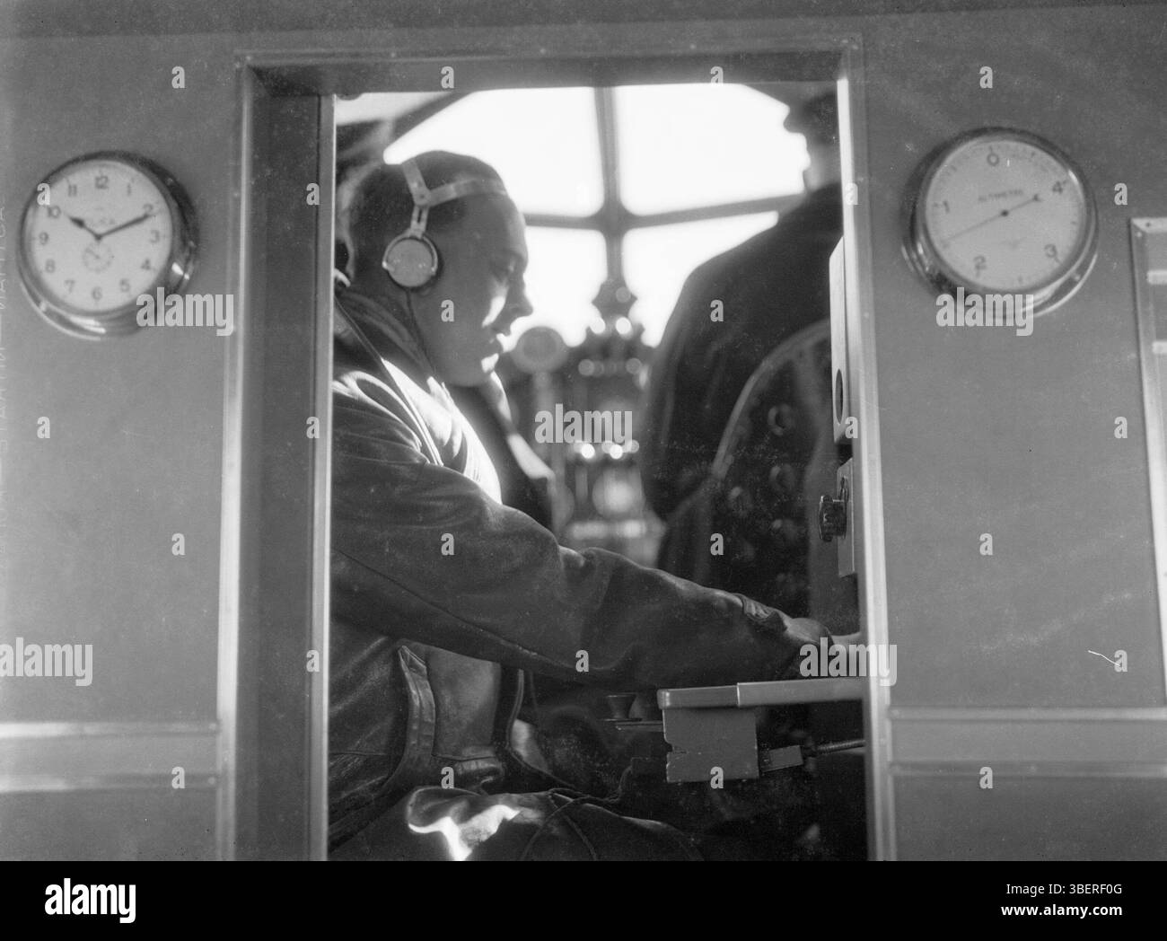 1930s Berlin: Radio operator and pilots in the cockpit of the Fokker F ...