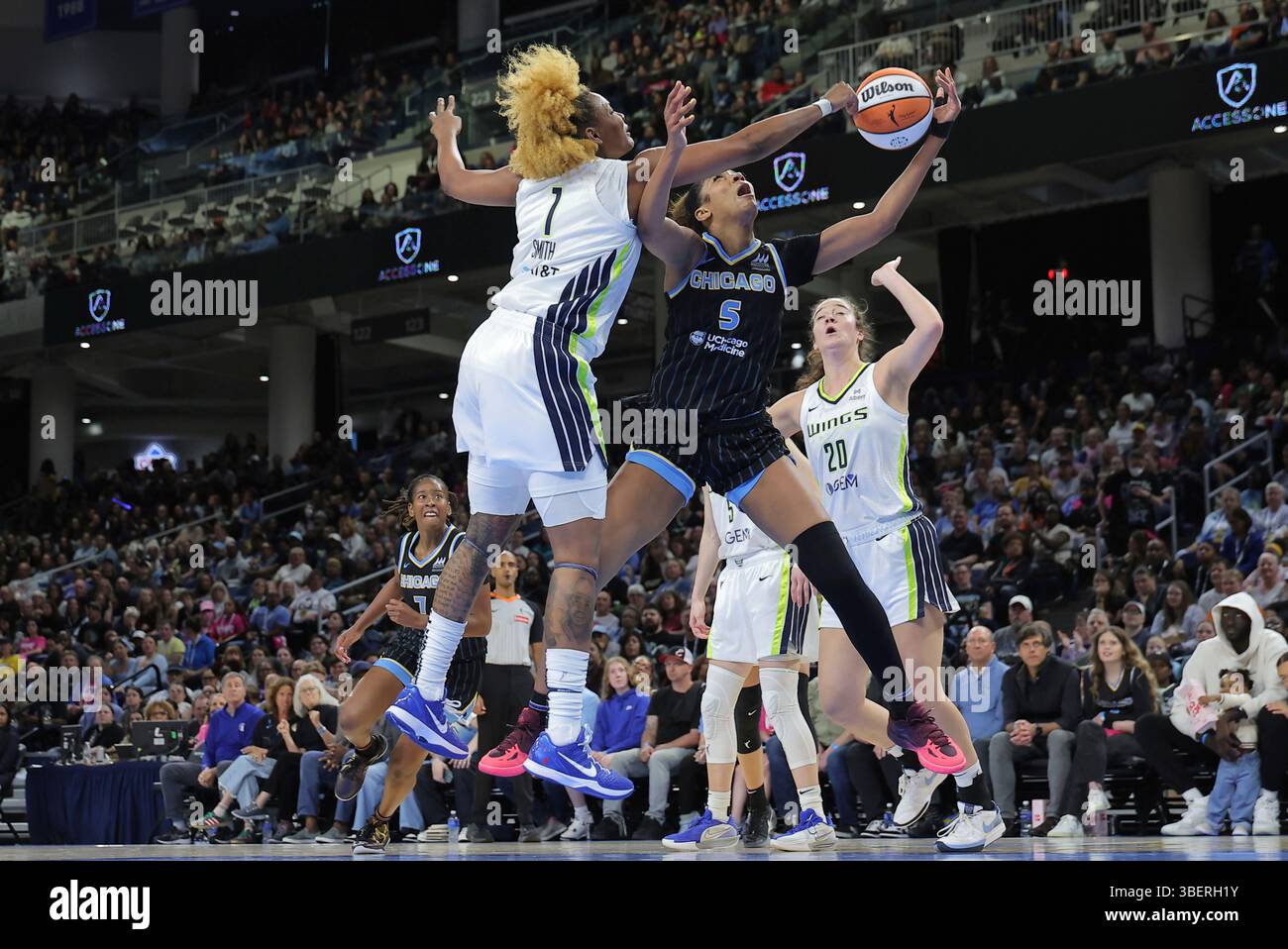 CHICAGO, IL - MAY 29: NaLyssa Smith #1 of the Dallas Wings blocks Angel Reese #5 of the Chicago ...