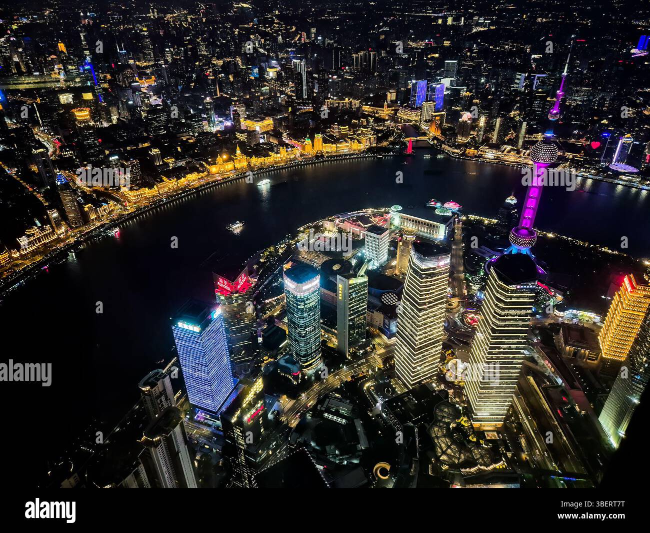 Shanghai, China - 1 April 2025: Aerial night view of Lujiazui and the ...