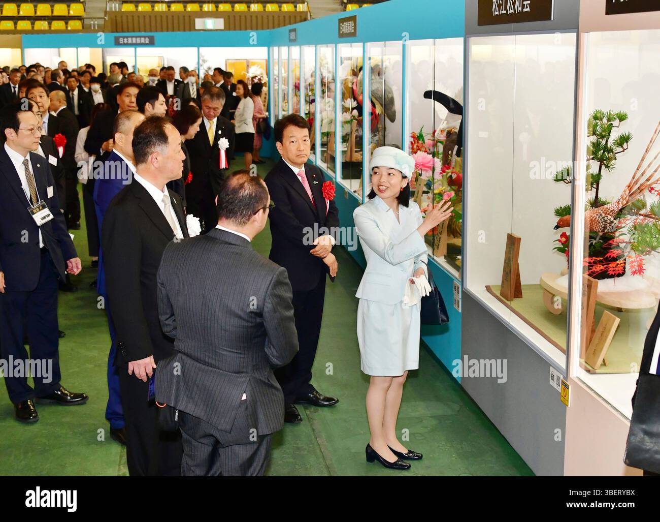 Princess Akiko of Mikasa looks at the display of crafted ...