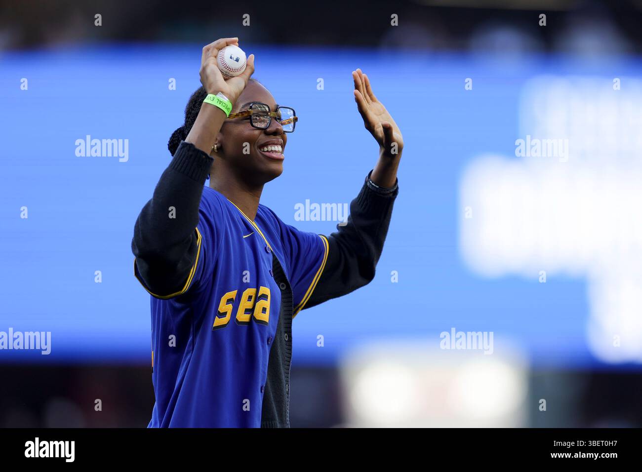 Seattle Storm forward Dominique Malonga waves at fans before throwing ...