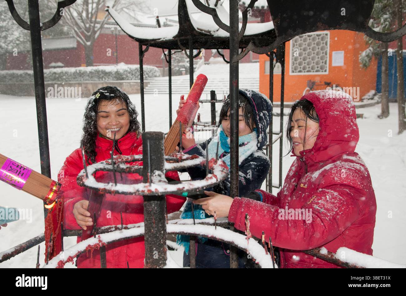 Praying in Qi Xia temple near Nanjing during a big winter snowstorm ...
