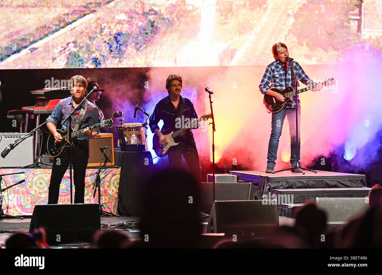 Musician John Fogerty, right, performs with his sons Shane Fogerty, far ...