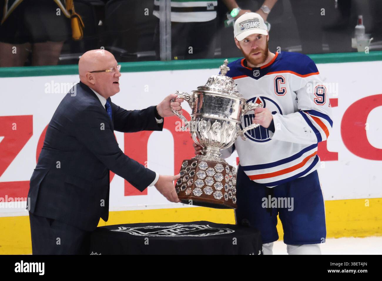 Edmonton Oilers center Connor McDavid (97) is presented with the ...