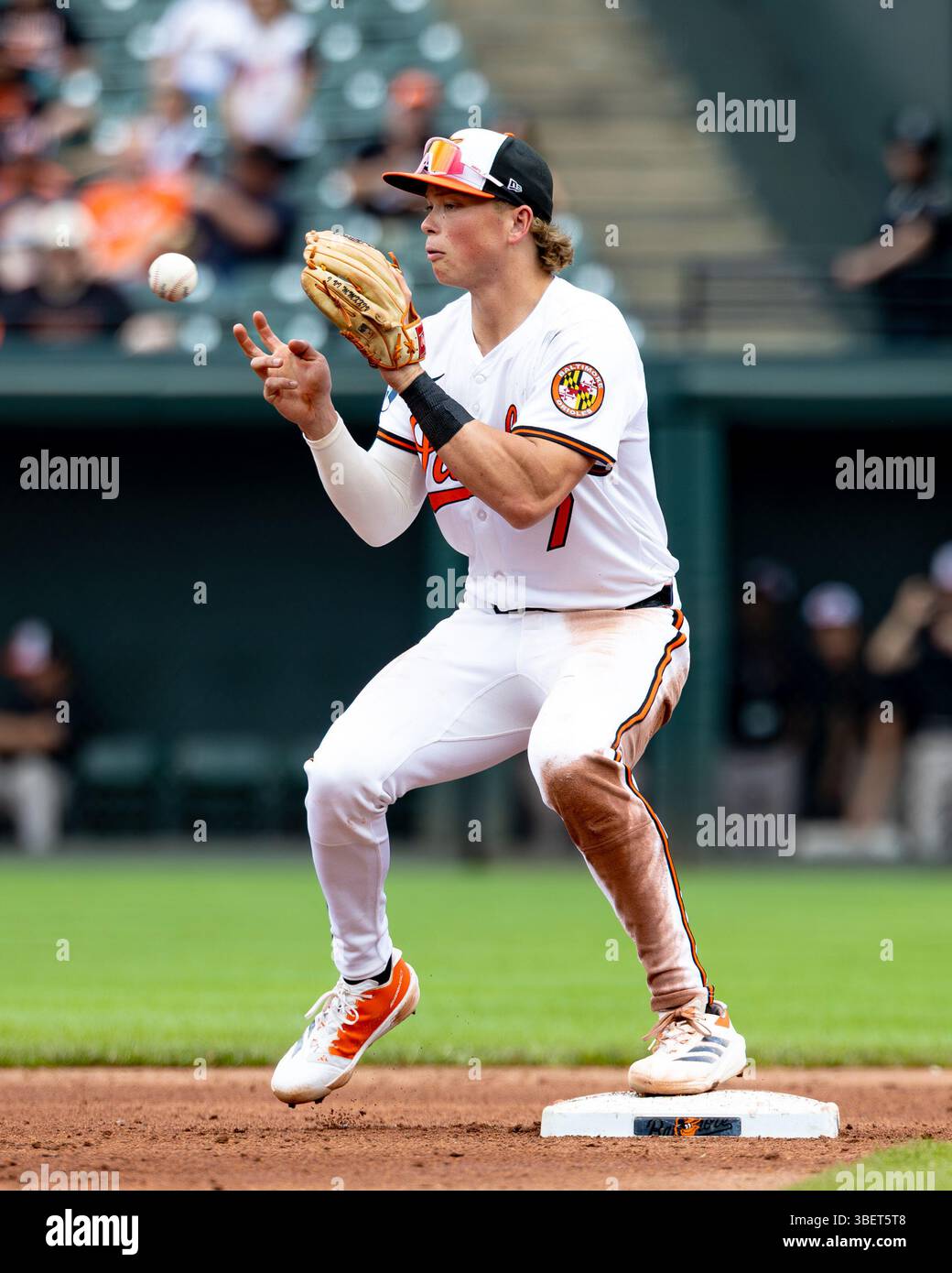 Baltimore Orioles’ Jackson Holliday turns a double play against the ...
