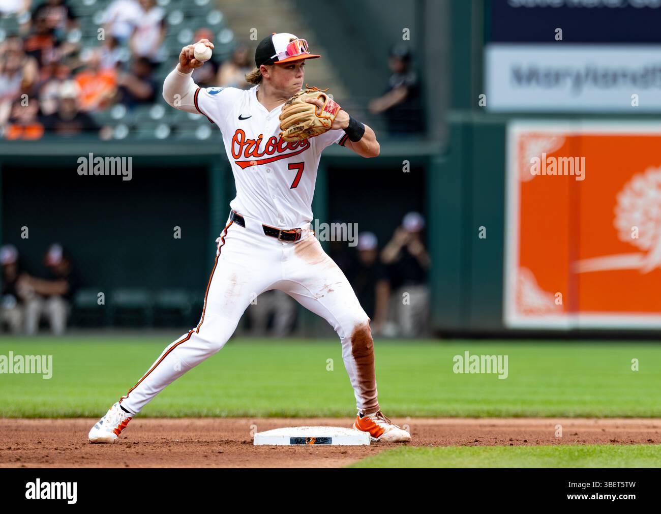 Baltimore Orioles’ Jackson Holliday turns a double play against the ...