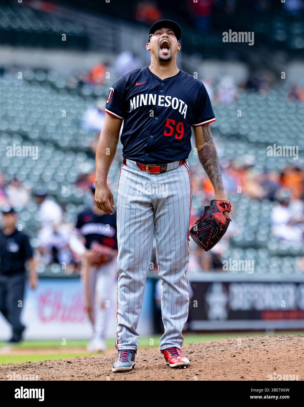 Minnesota Twins relief pitcher Jhoan Duran reacts to a strikeout ...