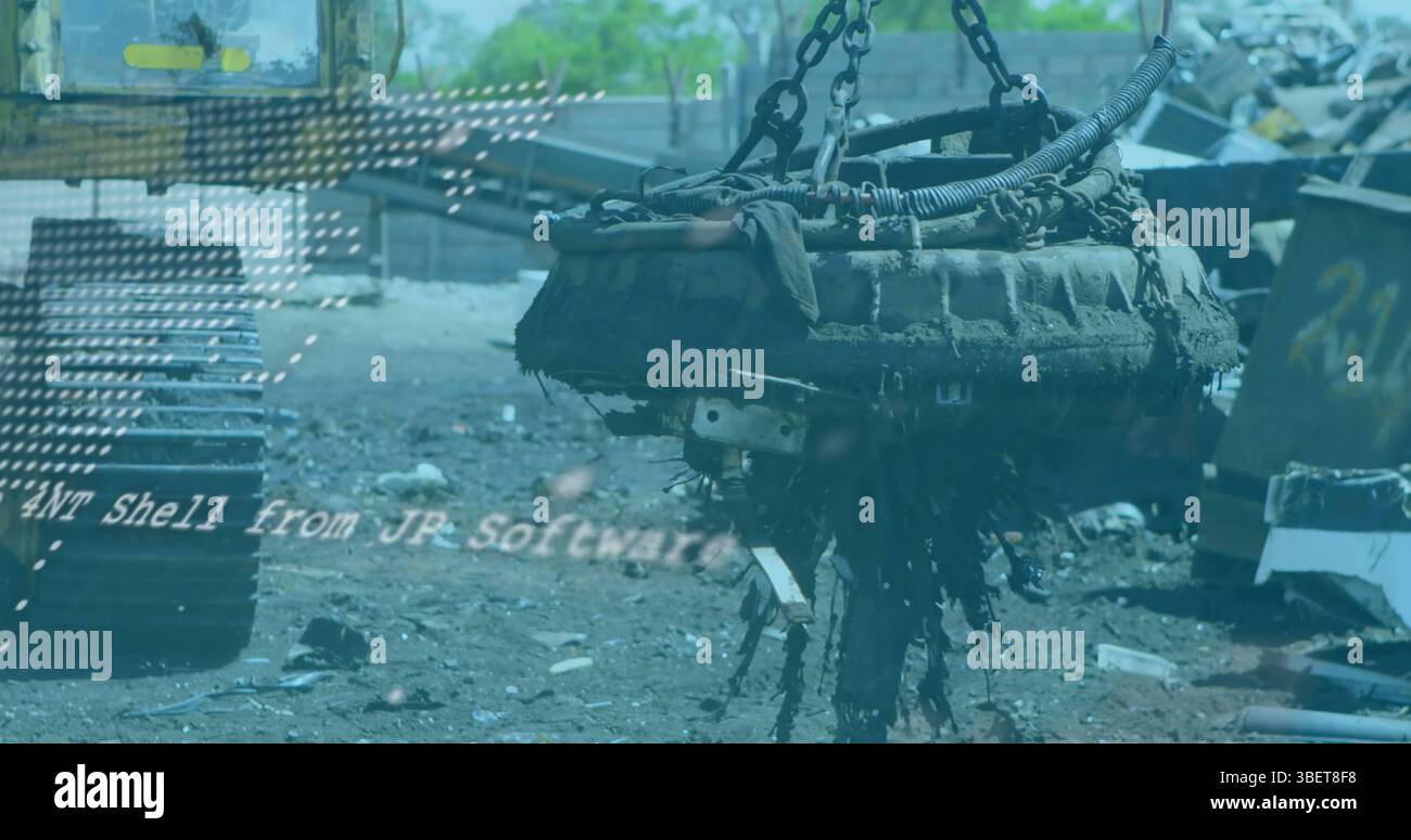 Hoisting electromagnet lifter raising corroded engine block over scrap ...