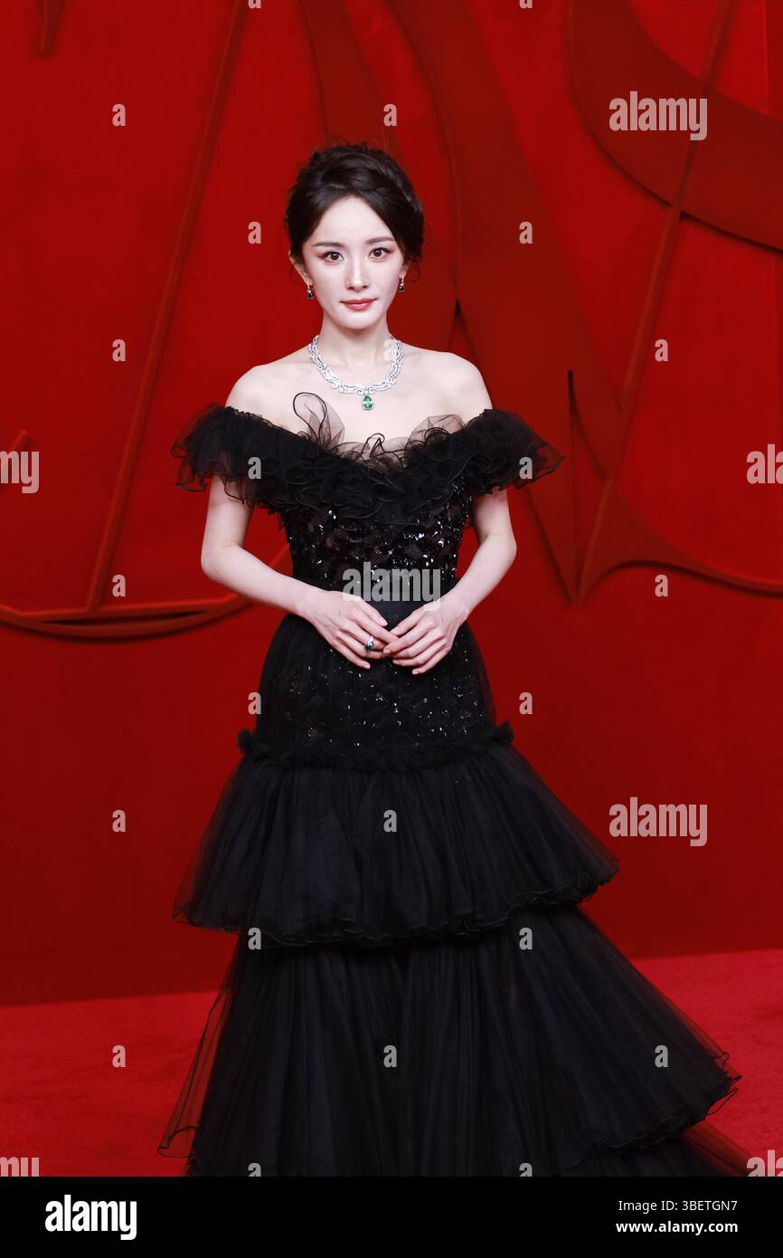 Chinese actress and singer Yang Mi attends an activity in Shanghai ...