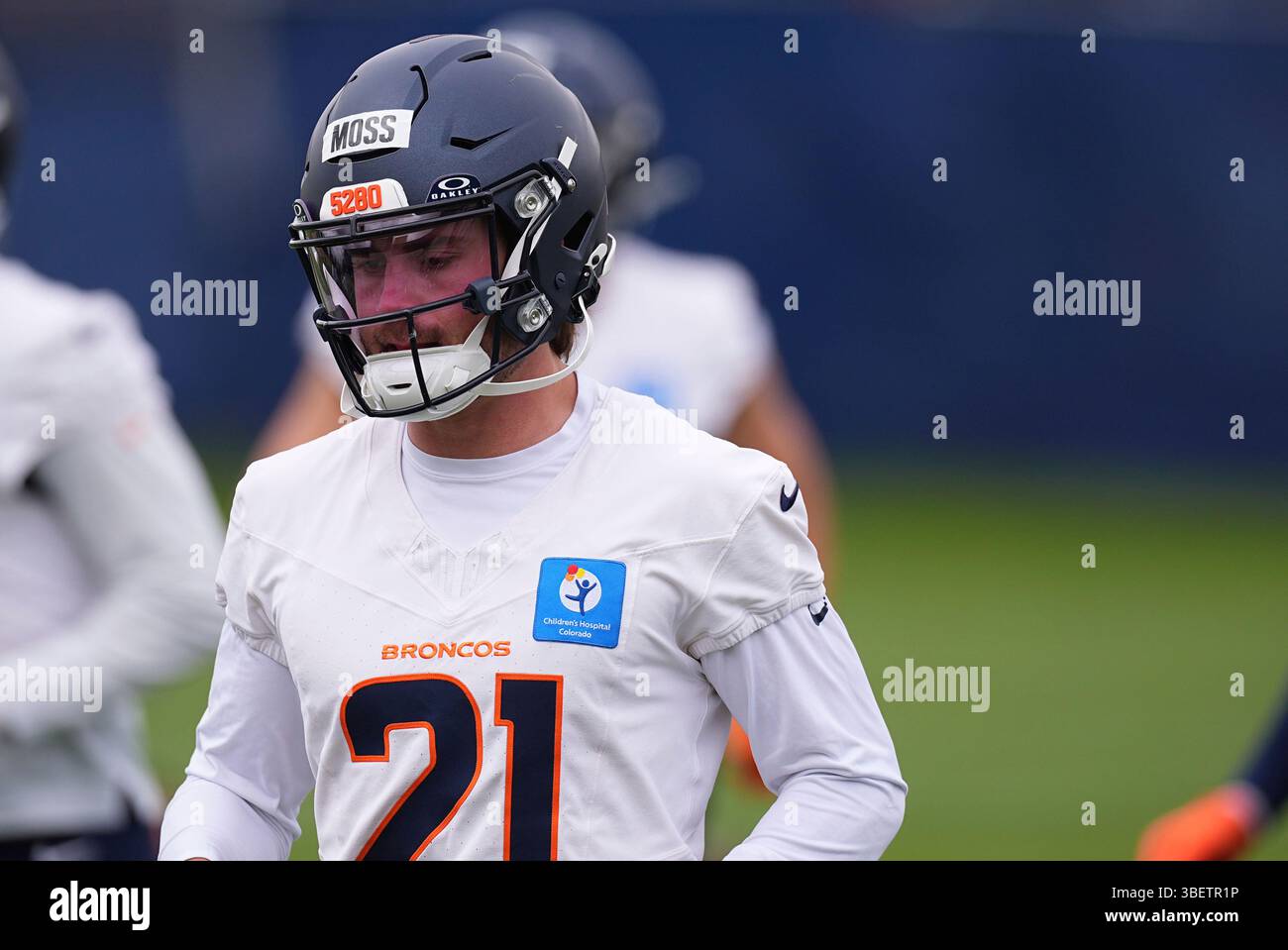 Denver Broncos cornerback Riley Moss (21) takes part in drills during ...