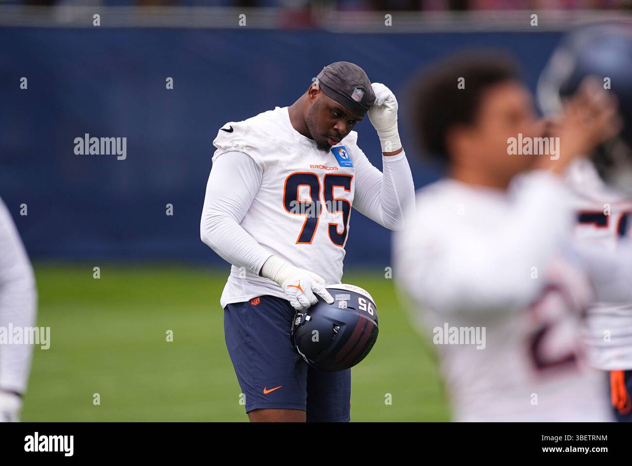 Denver Broncos defensive end Sai'vion Jones (95) takes part in drills during an NFL football ...