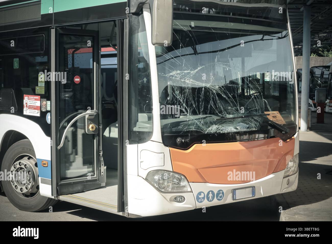 unbreakable frontal glass damaged by crash in a public transport bus ...