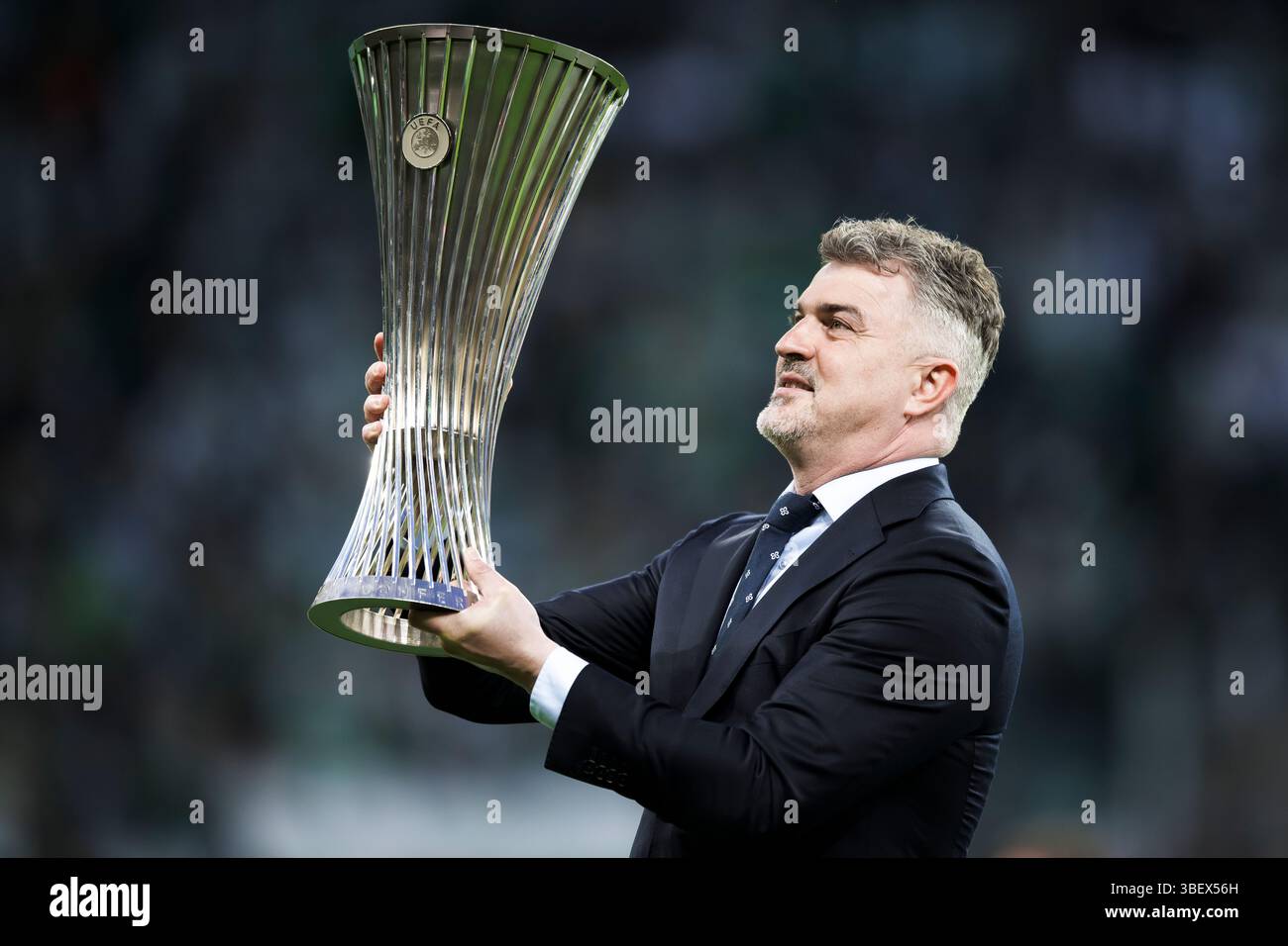 MichaL Zewlakow holds the trphy prior to the UEFA Conference League ...