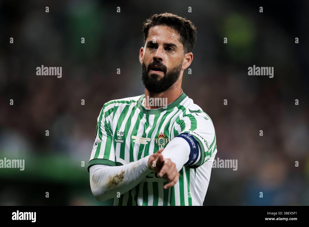 Isco of Real Betis Balompie adjusts his captain armband during the UEFA ...