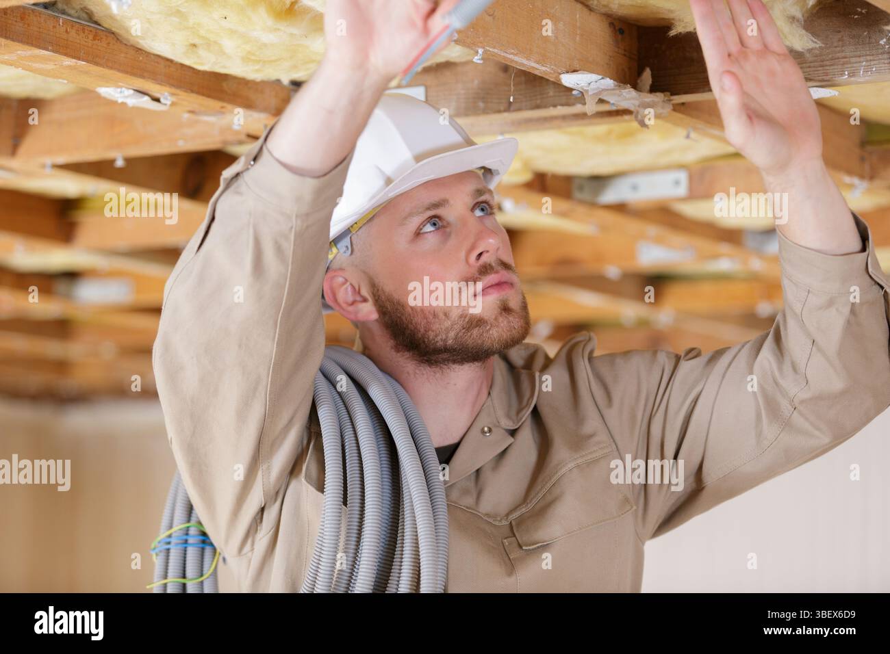 Worker fixing ventilation ducts hi-res stock photography and images - Alamy