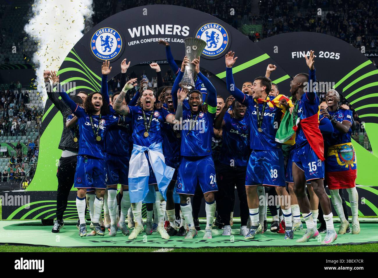 Reece James of Chelsea FC lifts the trophy as teammates celebrate ...