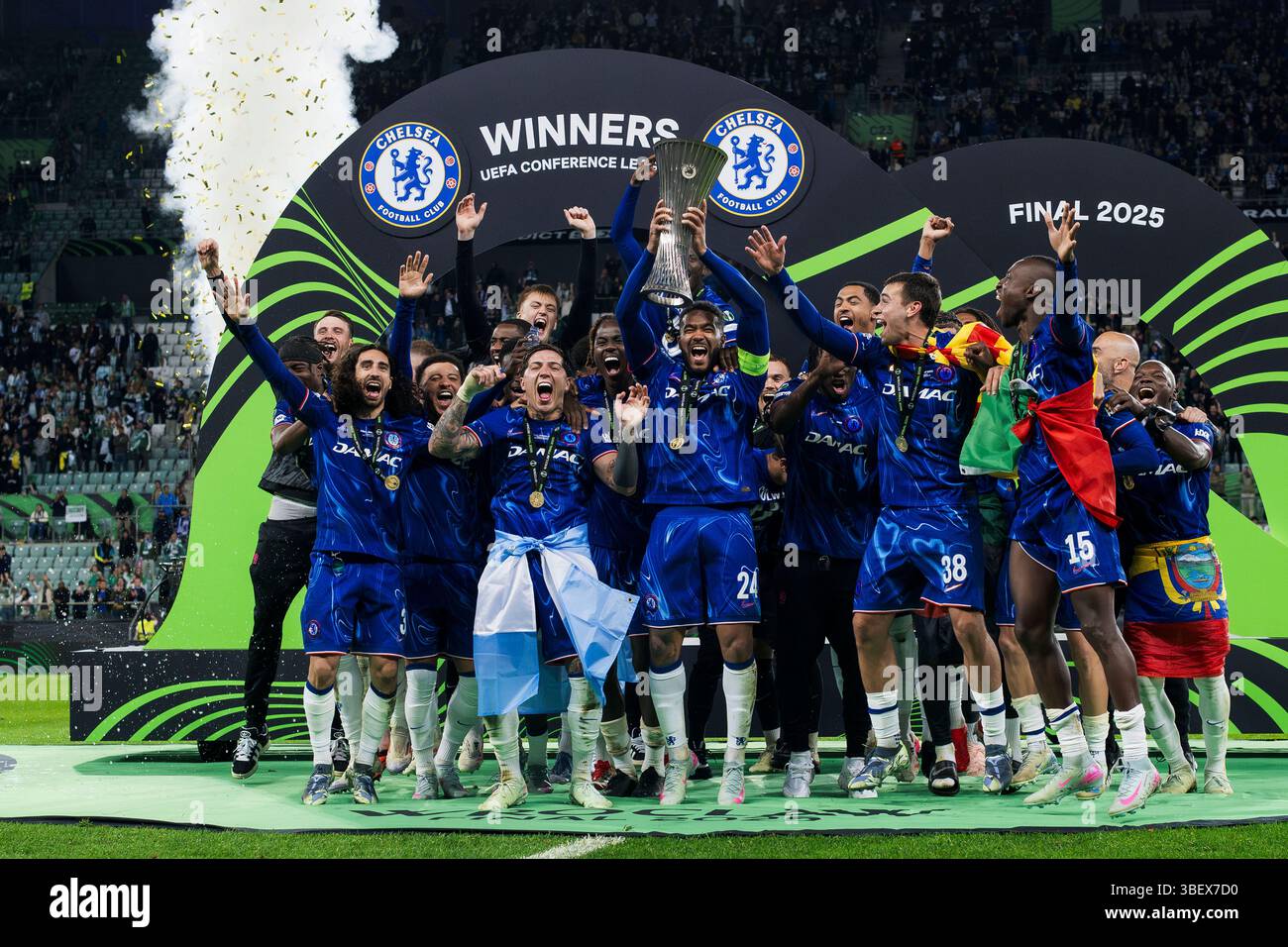 Reece James of Chelsea FC lifts the trophy as teammates celebrate ...