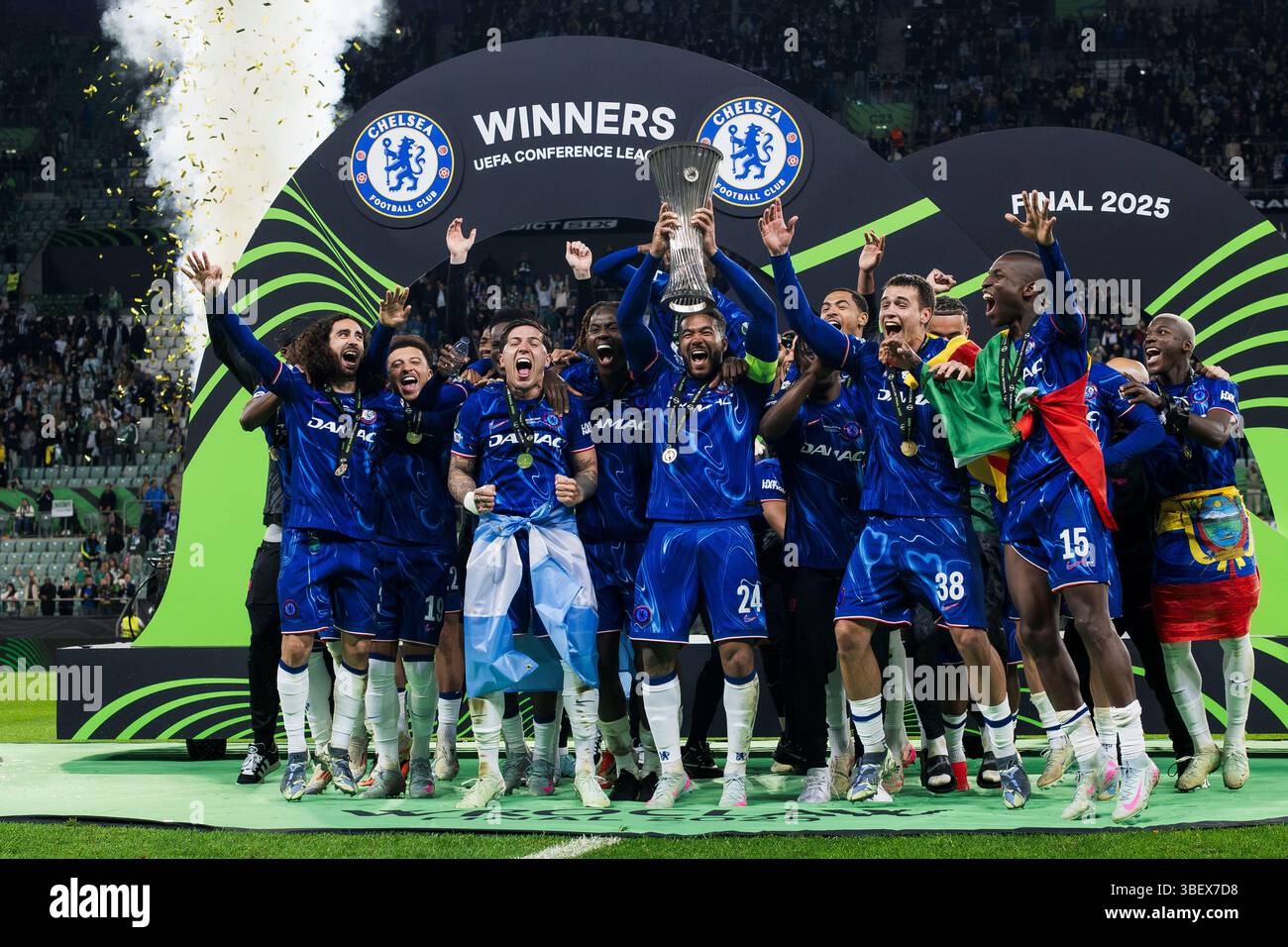 Reece James of Chelsea FC lifts the trophy as teammates celebrate ...