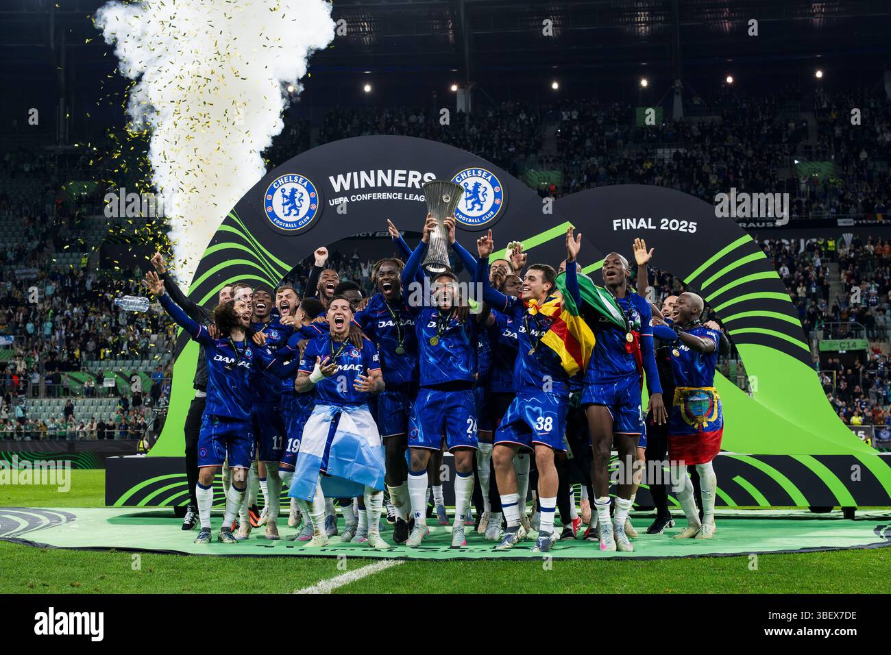 Reece James of Chelsea FC lifts the trophy as teammates celebrate ...