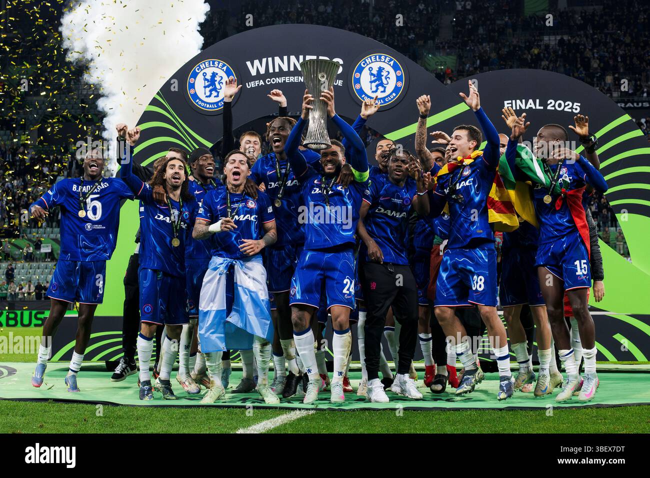 Reece James of Chelsea FC lifts the trophy as teammates celebrate ...