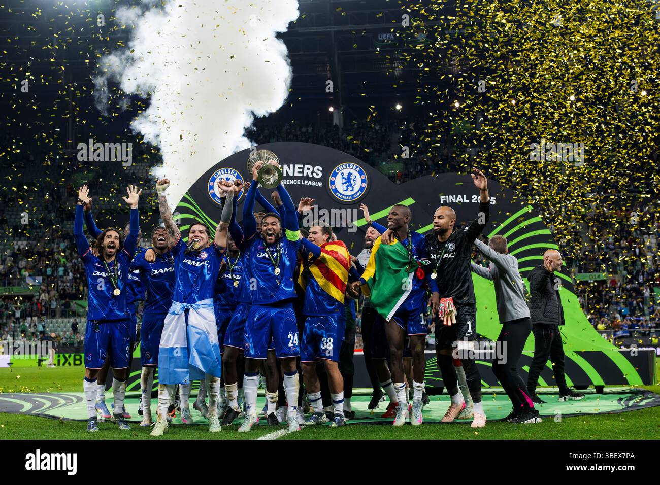 Reece James of Chelsea FC lifts the trophy as teammates celebrate ...