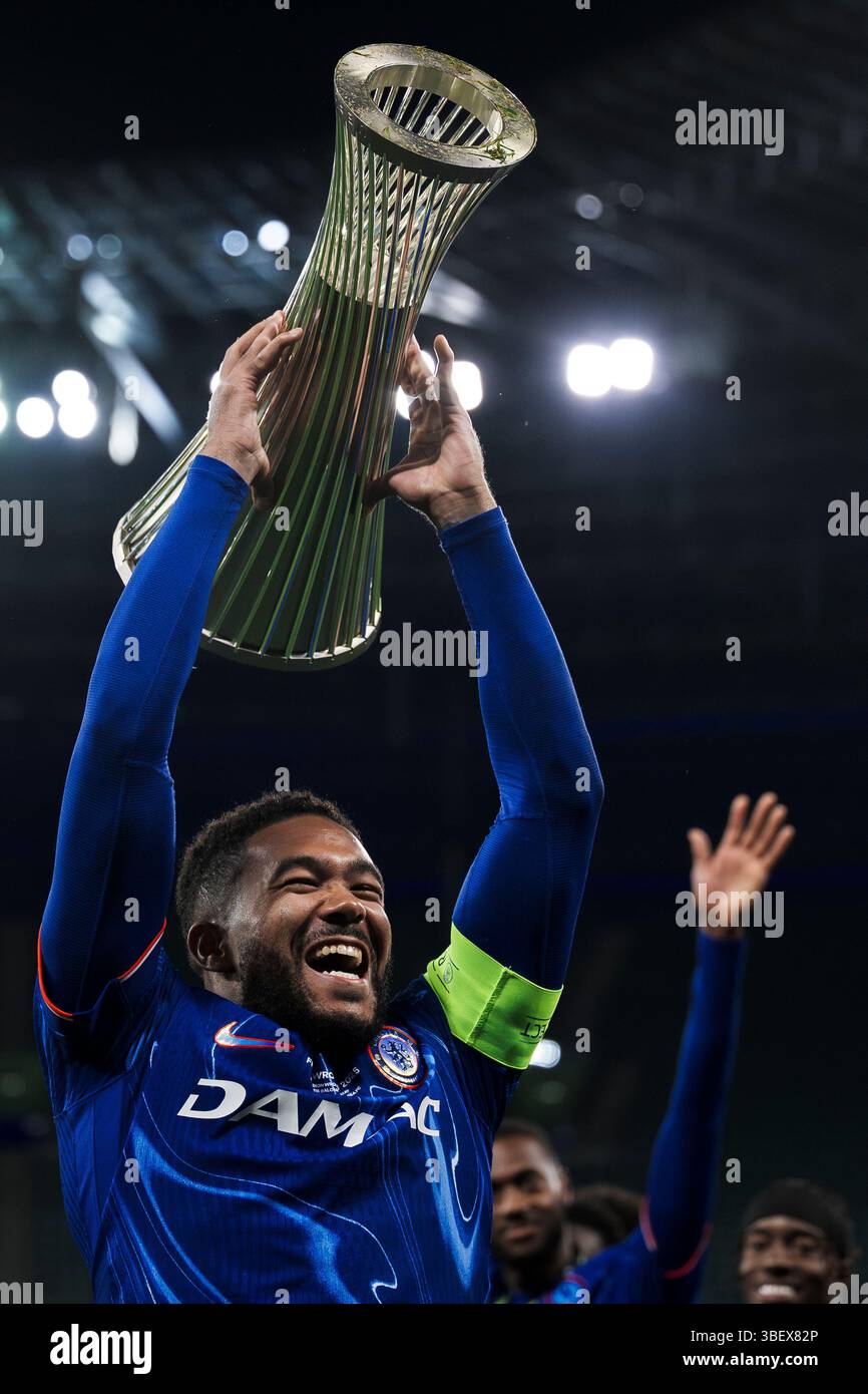 Reece James of Chelsea FC lifts the trophy during the award ceremony ...