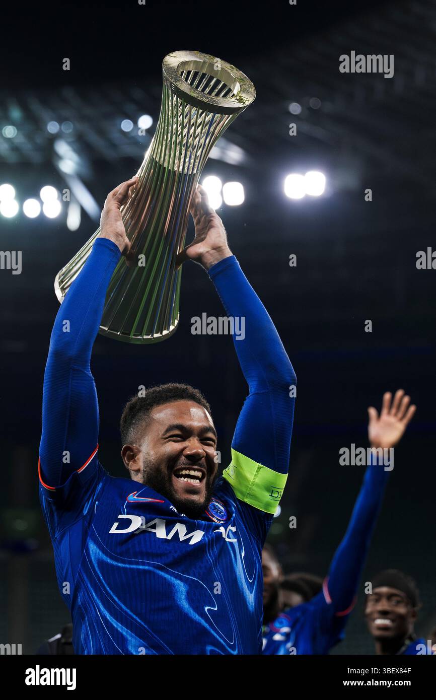 Reece James of Chelsea FC lifts the trophy during the award ceremony ...