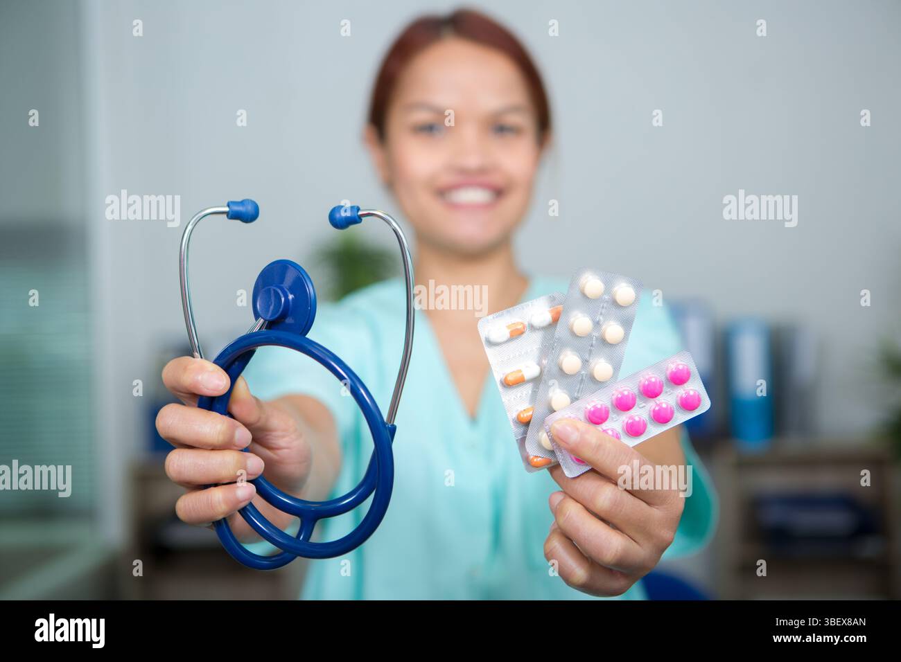 Female doctor holds pills hi-res stock photography and images - Alamy