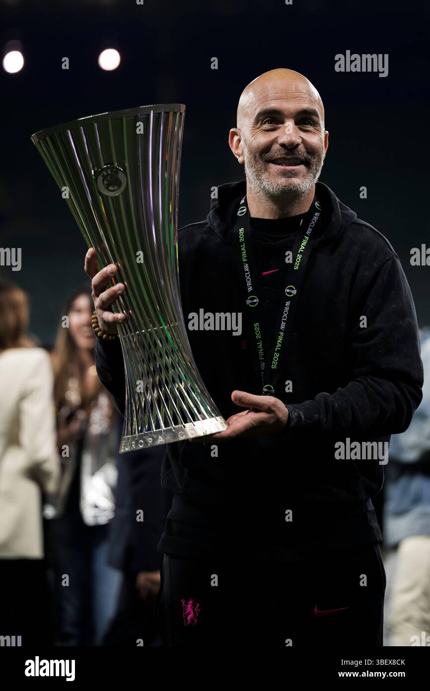 Enzo Maresca, head coach of Chelsea FC, poses with the trophy during ...