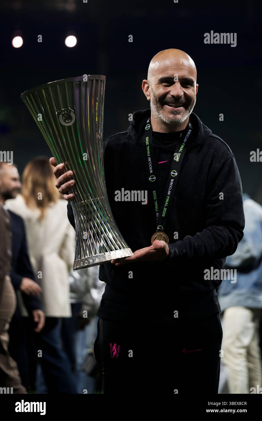 Enzo Maresca, head coach of Chelsea FC, poses with the trophy during ...