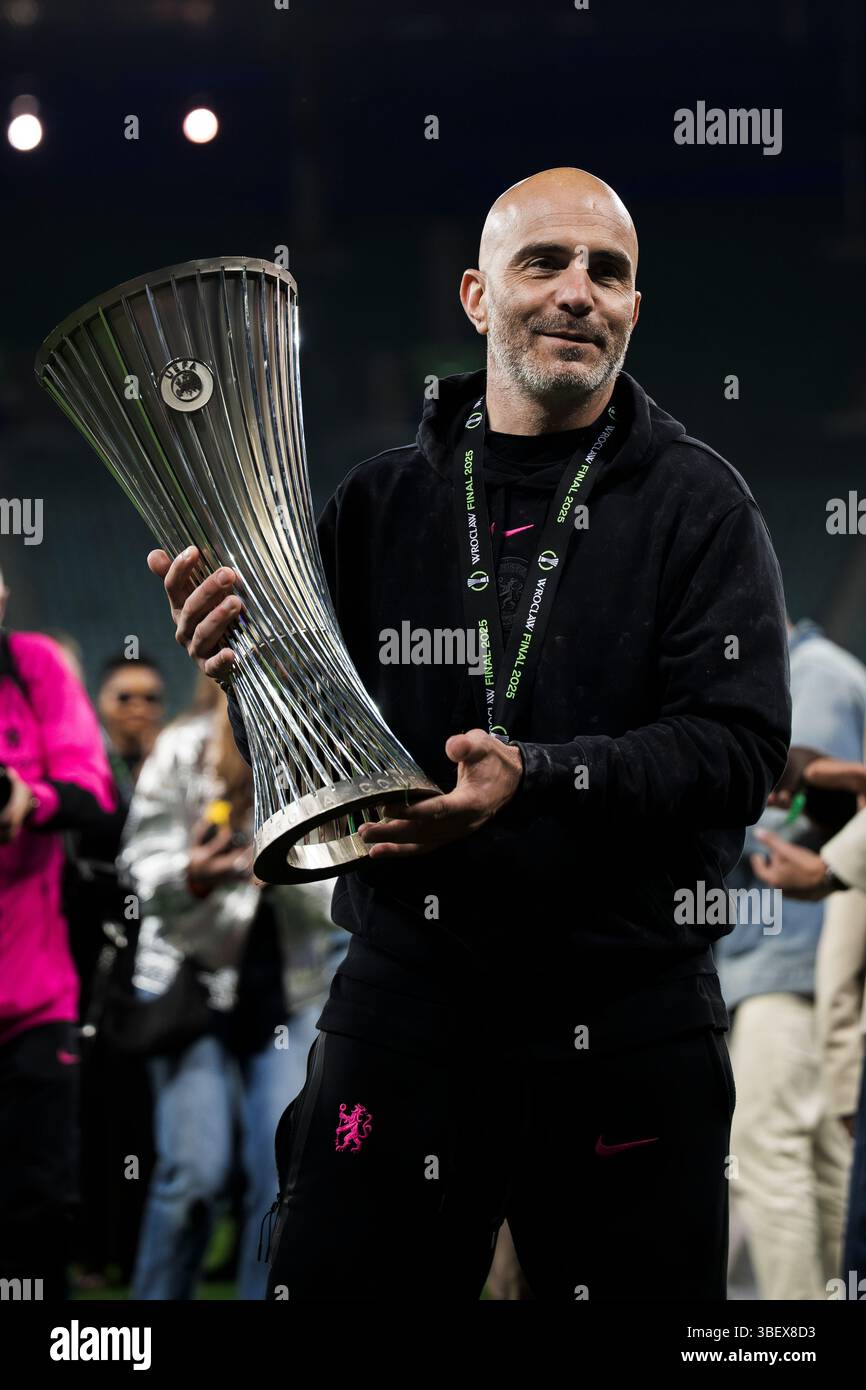 Enzo Maresca, head coach of Chelsea FC, poses with the trophy during ...