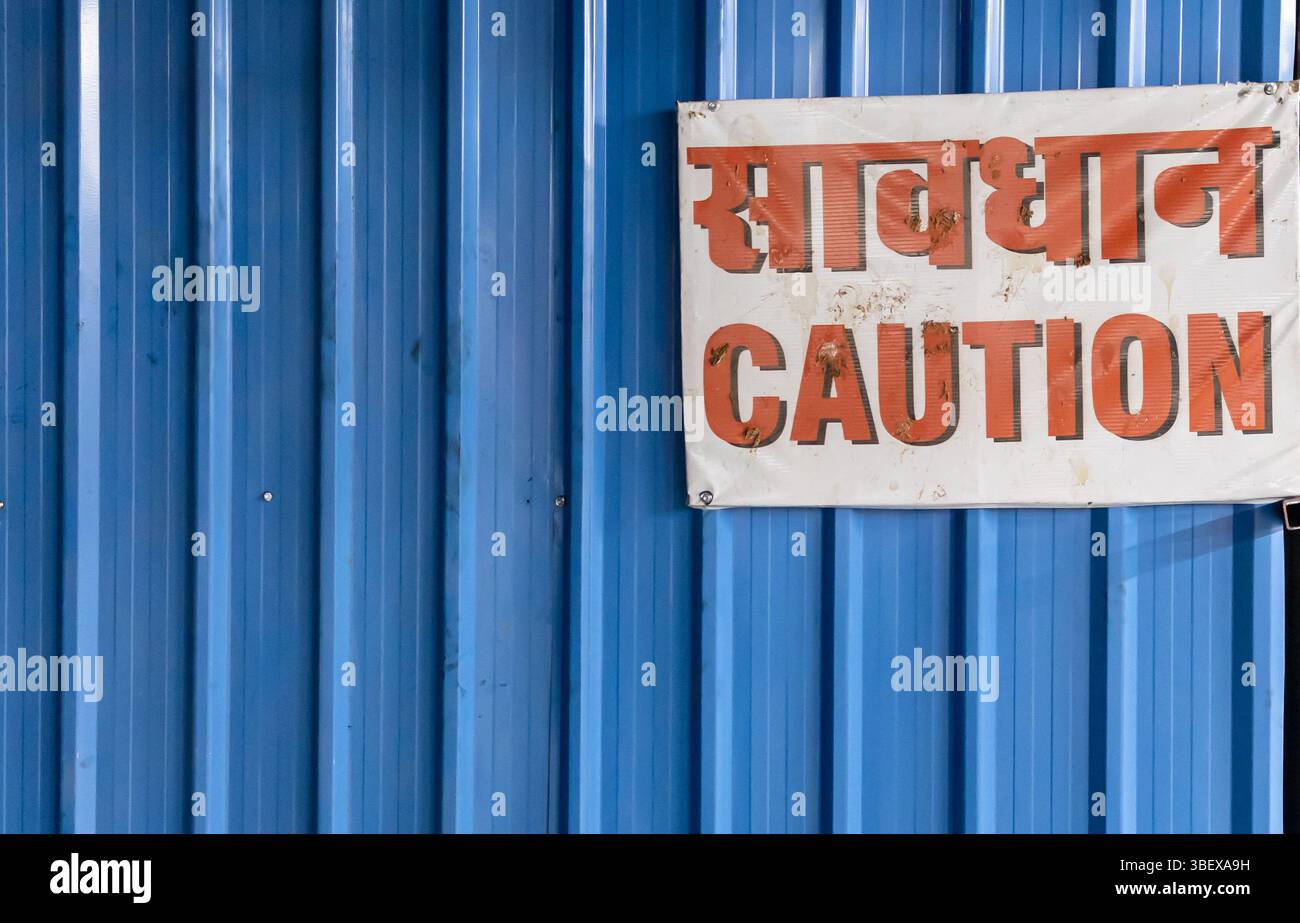 caution signboard at construction site at evening Stock Photo - Alamy