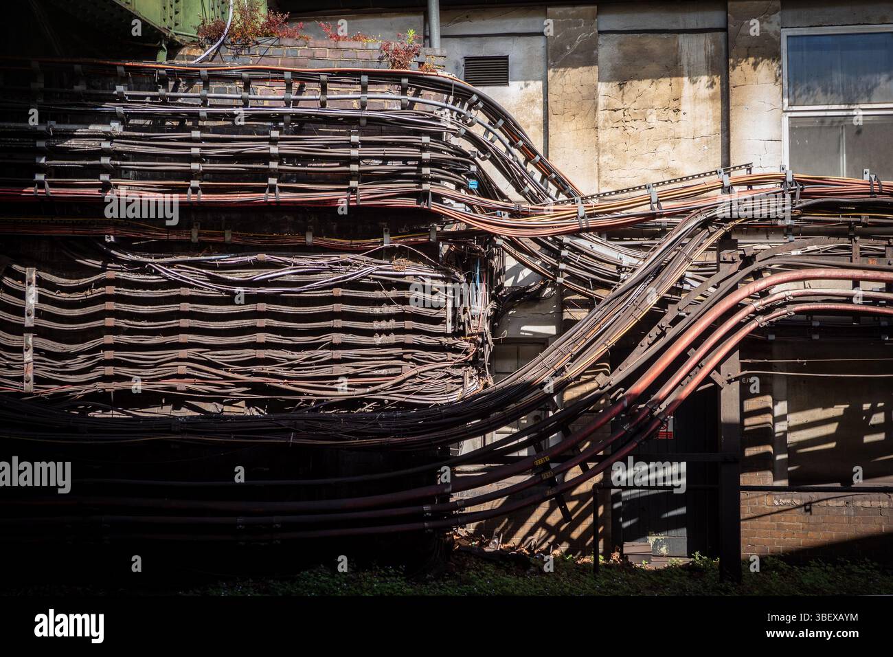 A complicated collection of cables and wires at a London Tube station ...
