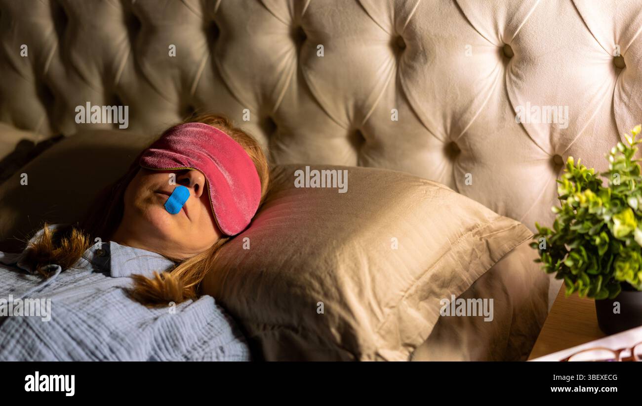 Peaceful Sleep with Nasal Breathing Aid and Sleep Mask. A woman ...