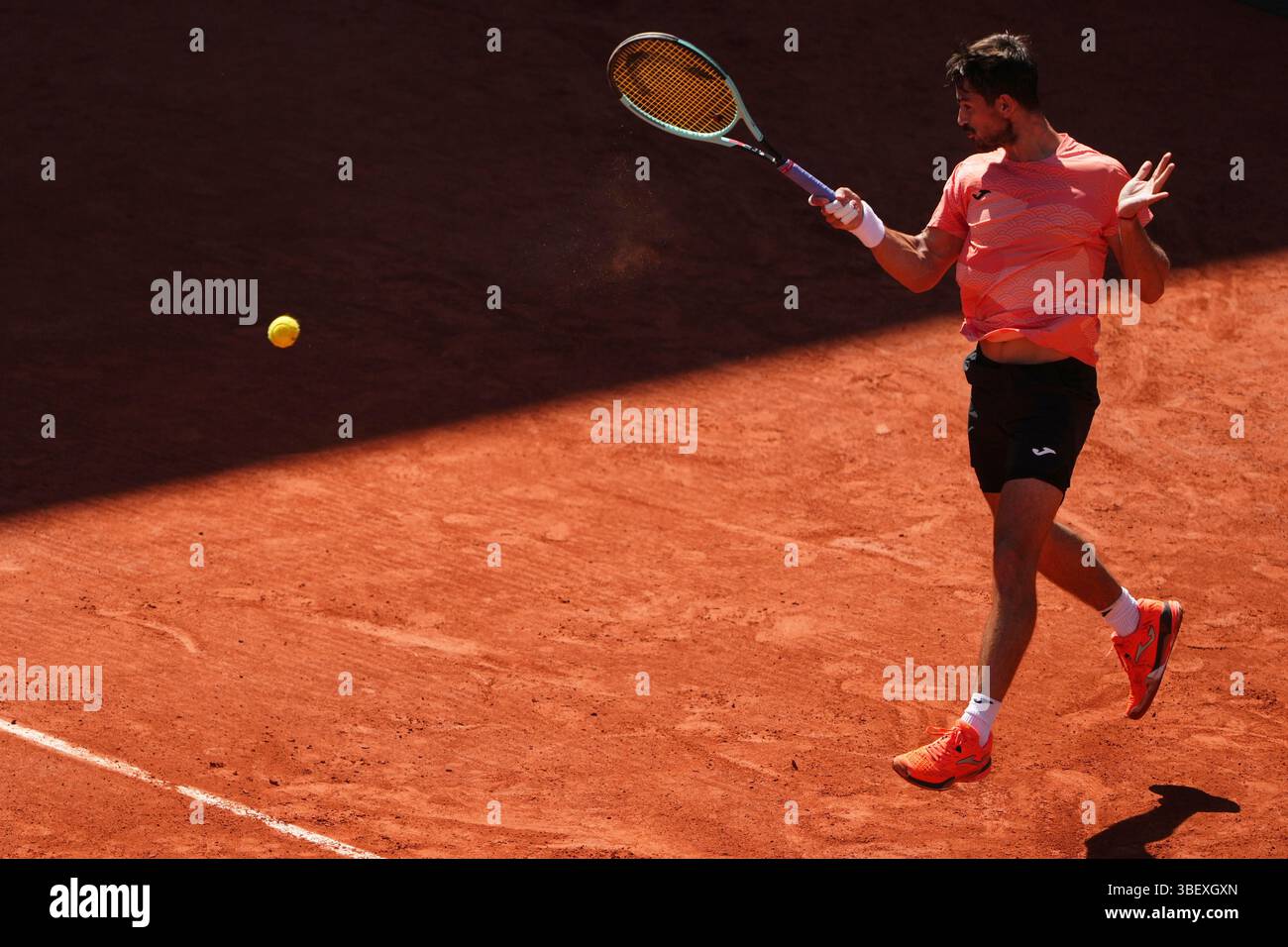 Argentina's Mariano Navone hits a forehand against Italy's Lorenzo ...