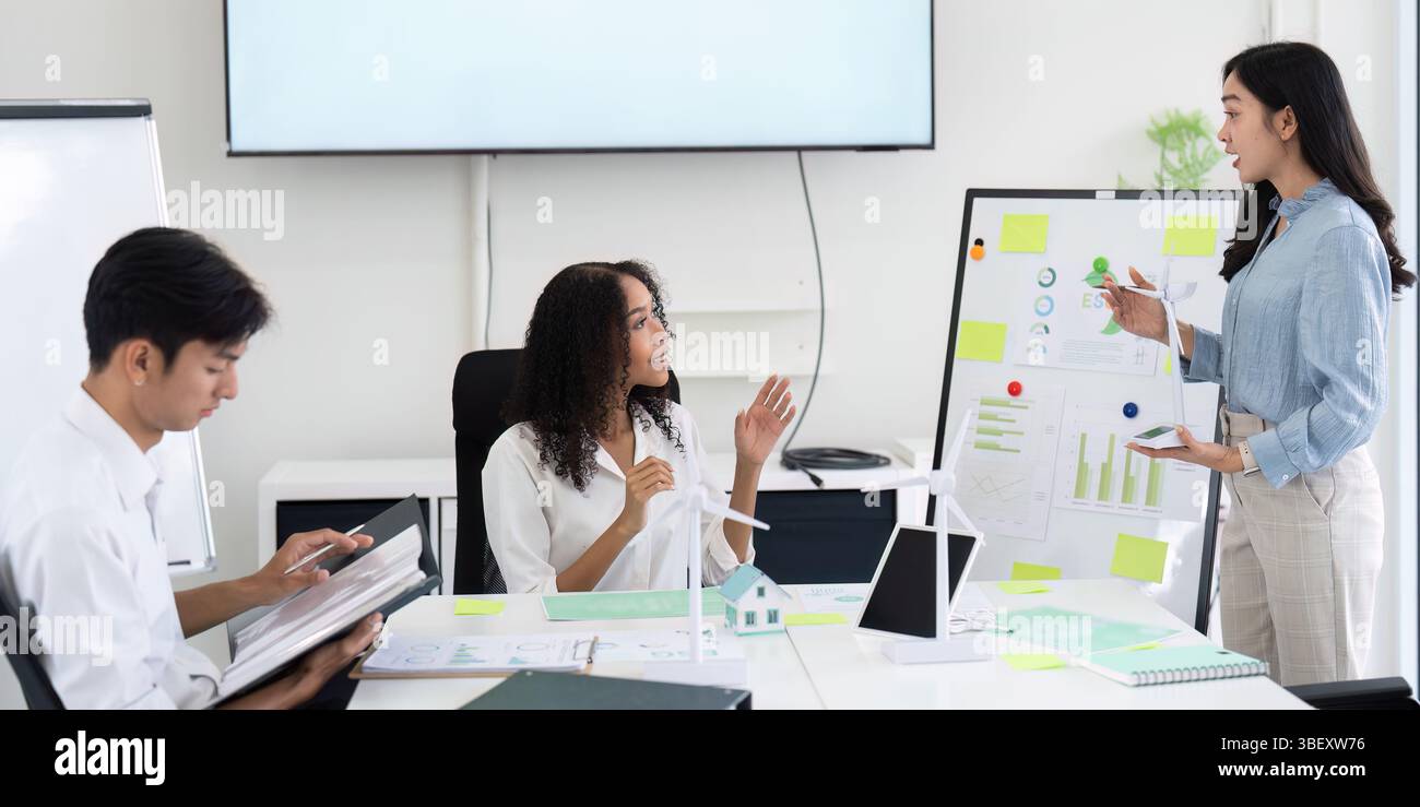 Sustainability and Teamwork. A diverse team collaborating on ...