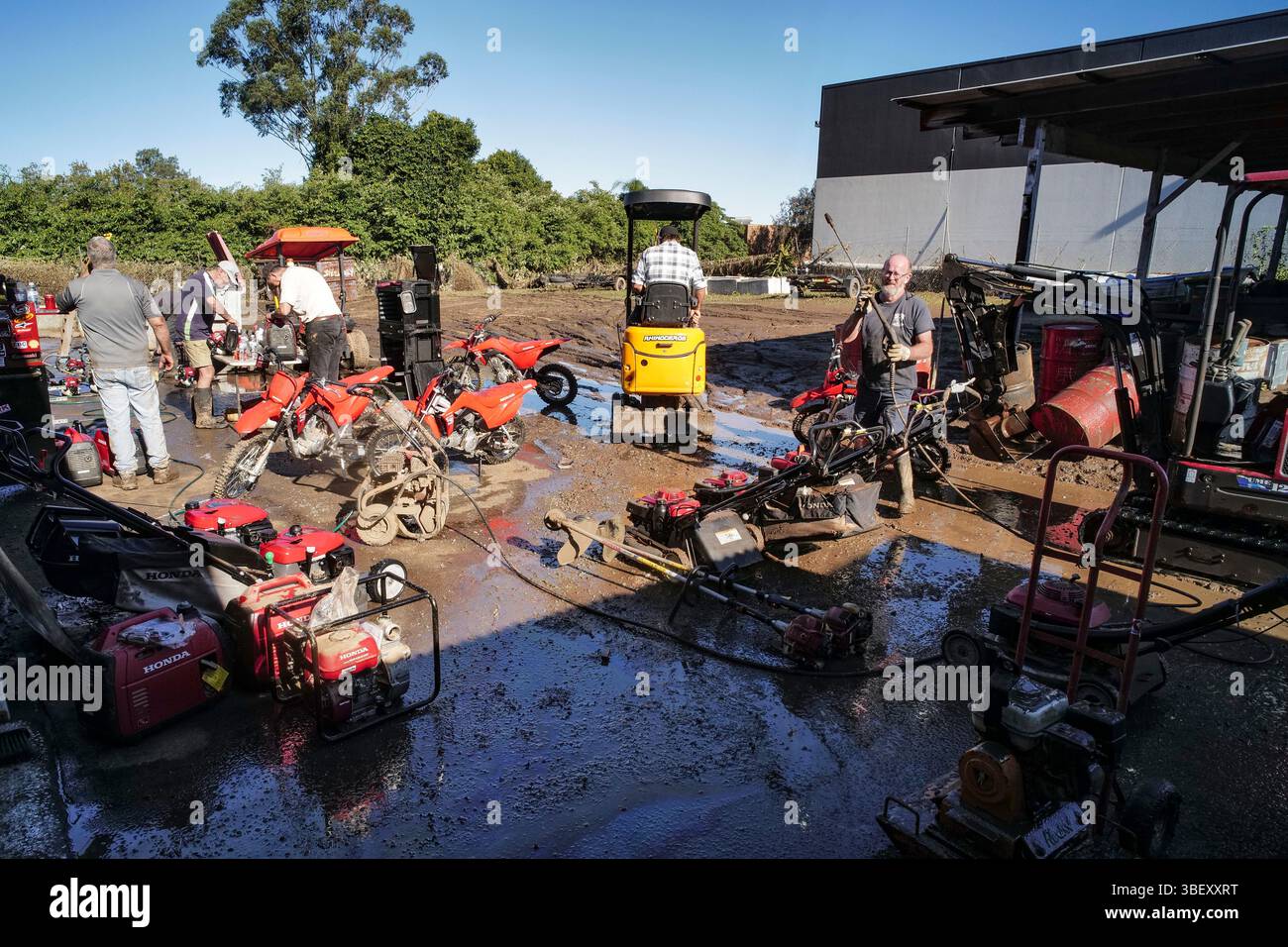 Taree, Australia. 24th May, 2025. Local businesses cleaning up after ...