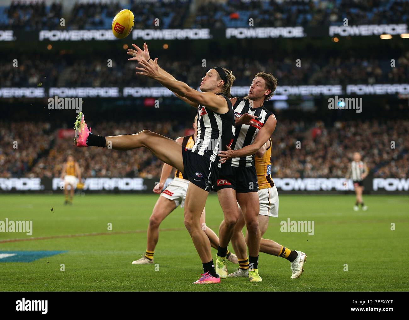Darcy Moore of the Magpies contests the ball during the AFL Round 12 ...