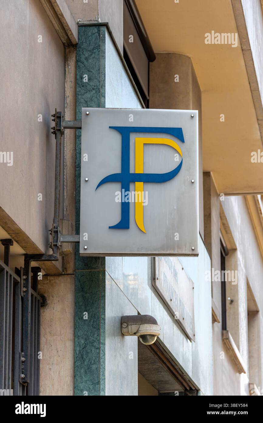 Sign and logo on the facade of a public finance center, an ...