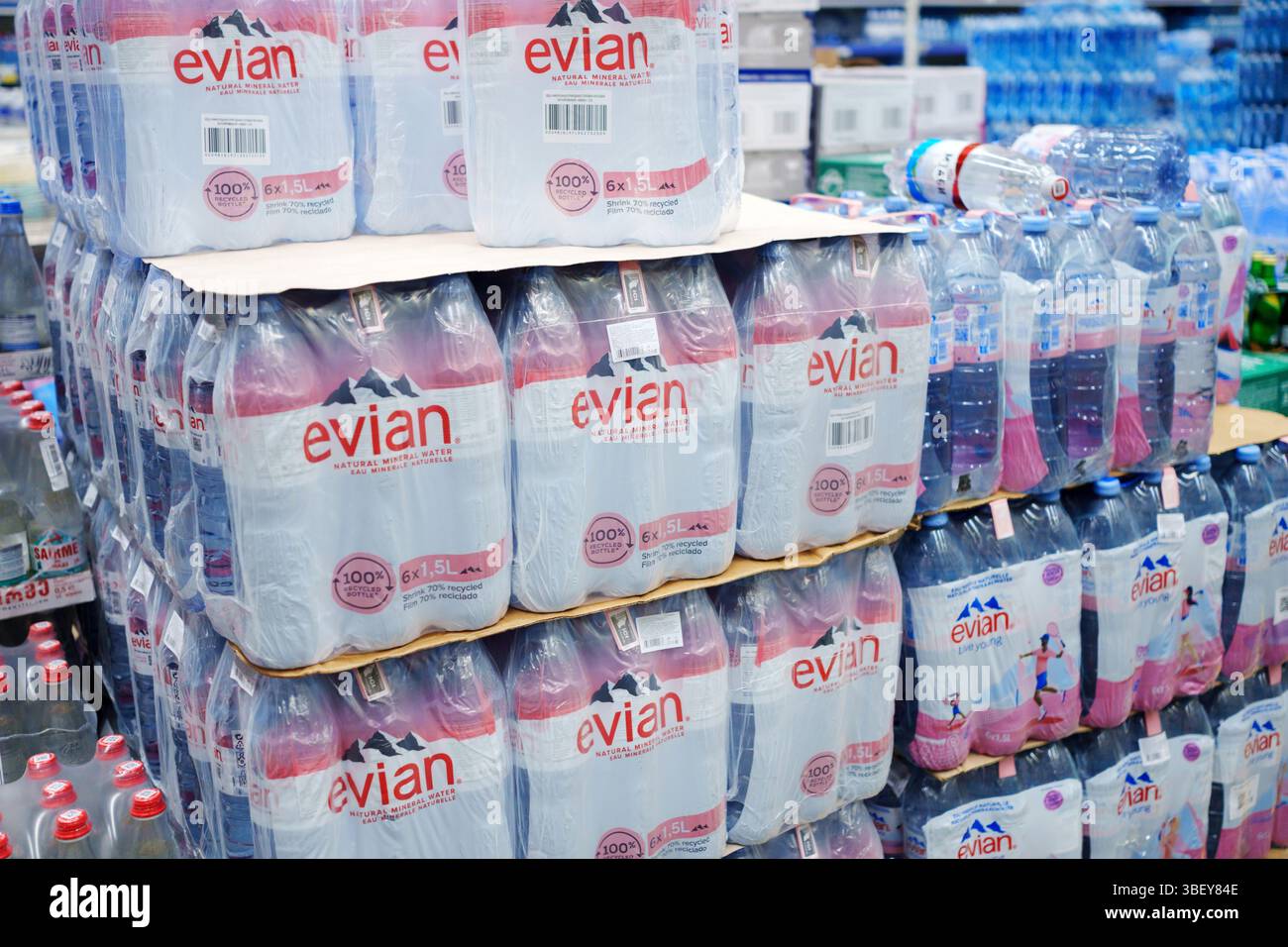 Tyumen, Russia-May 22, 2025: Evian brand famous drinking water, are placed on shelves in ...