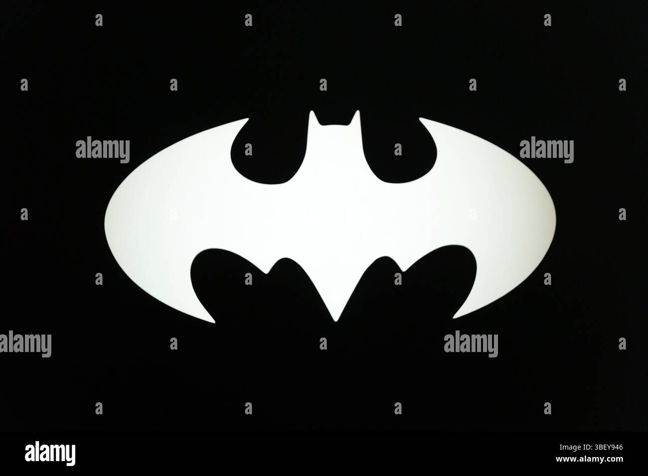 Tyumen, Russia-May 01, 2025: prominent bat symbol illuminates a dark ...