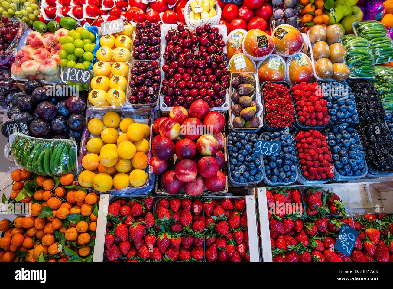 Colorful display berries local market hi-res stock photography and ...