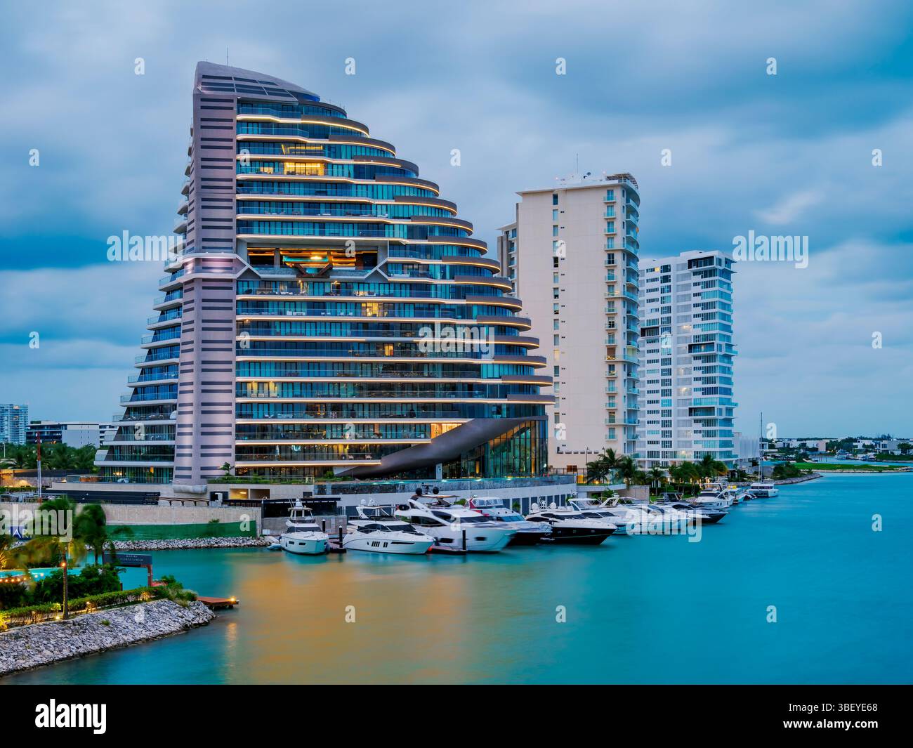 Shark Tower at dusk, Puerto Cancun, Cancun, Quintana Roo State, Mexico ...