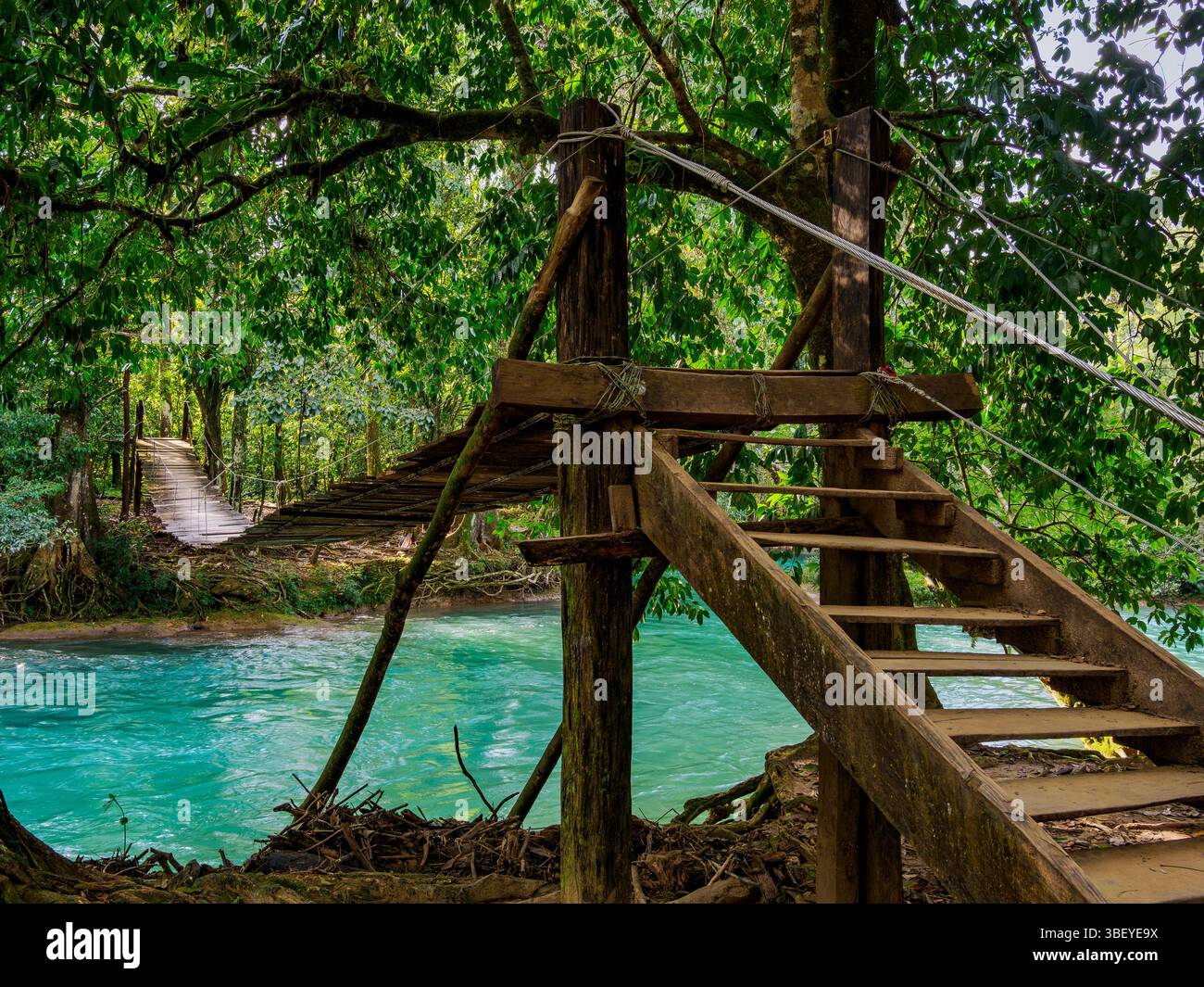 Hanging wooden bridge over Xanil River, Arroyo Agua Azul, Chiapas State ...