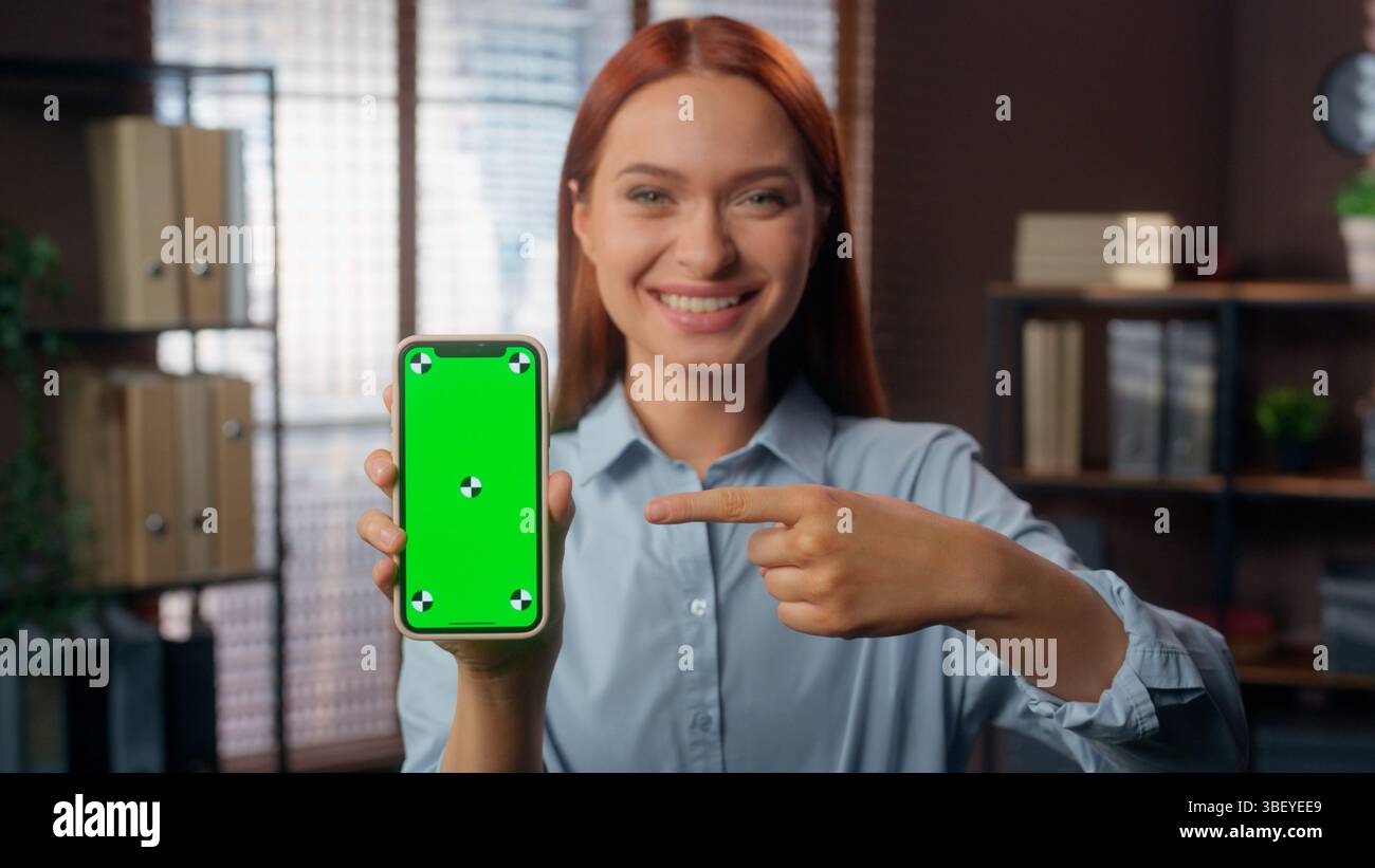 Business woman happy showing green screen mobile phone chroma key ...