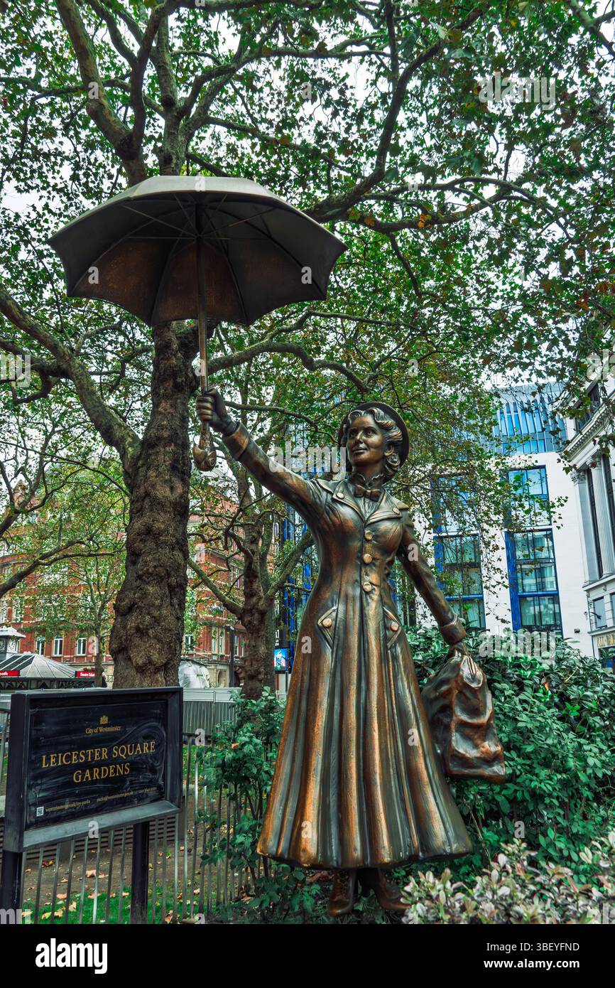London, UK Mary Poppins bronze statue holding an umbrella in Leicester ...