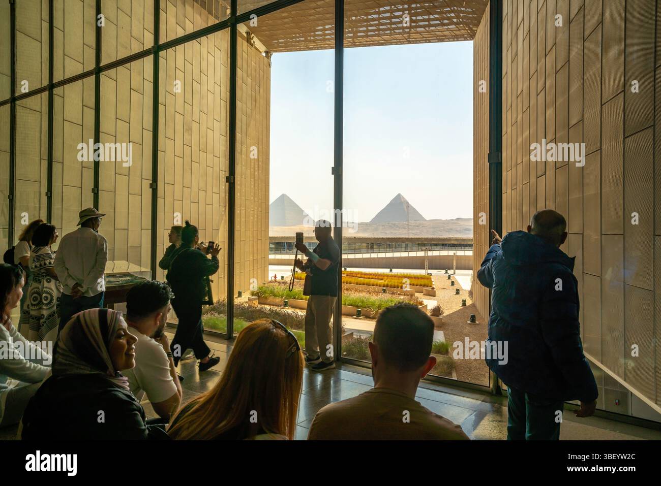 View of Giza Pyramids from the interior of the Grand Egyptian Museum ...