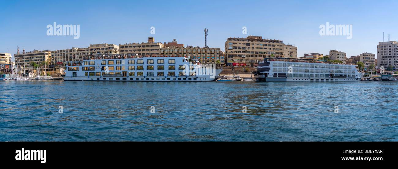 View of cruise boats on the Nile river from small boat in Aswan, Aswan ...
