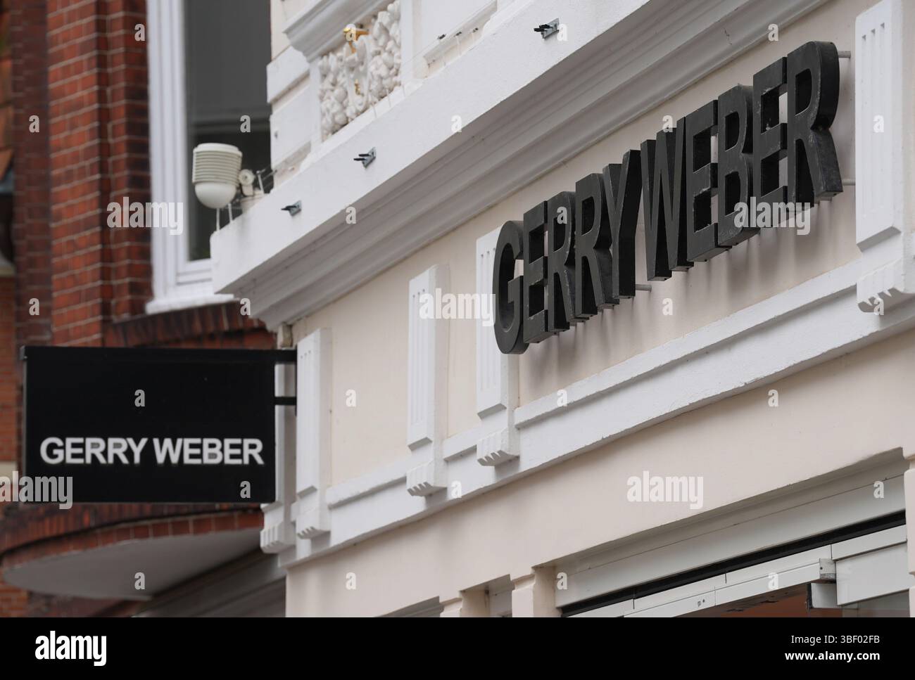 30 May 2025, Hamburg: View of the "Gerry Weber" lettering on a branch ...