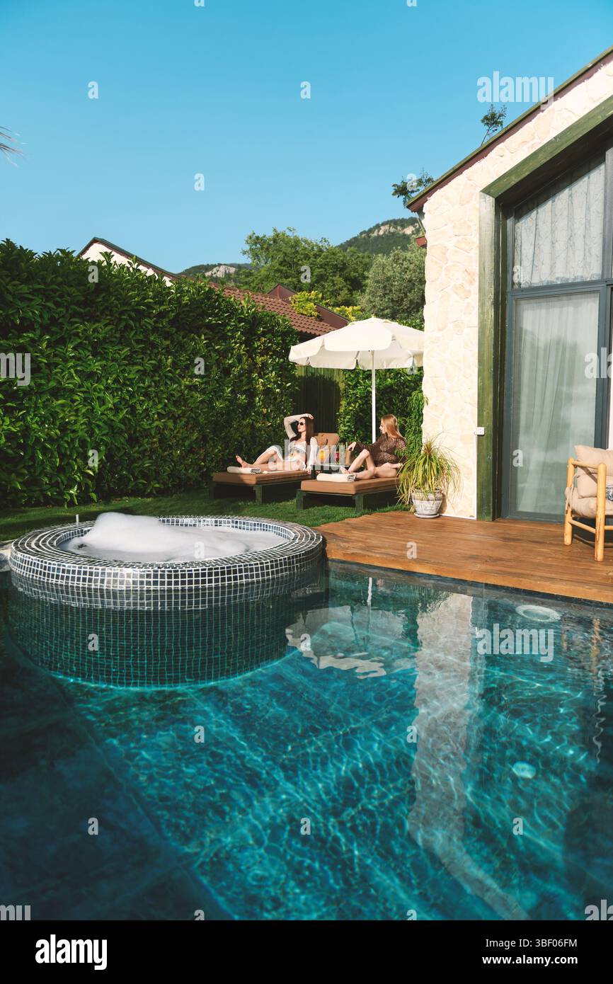 Two beautiful women in bikini hi-res stock photography and images - Alamy